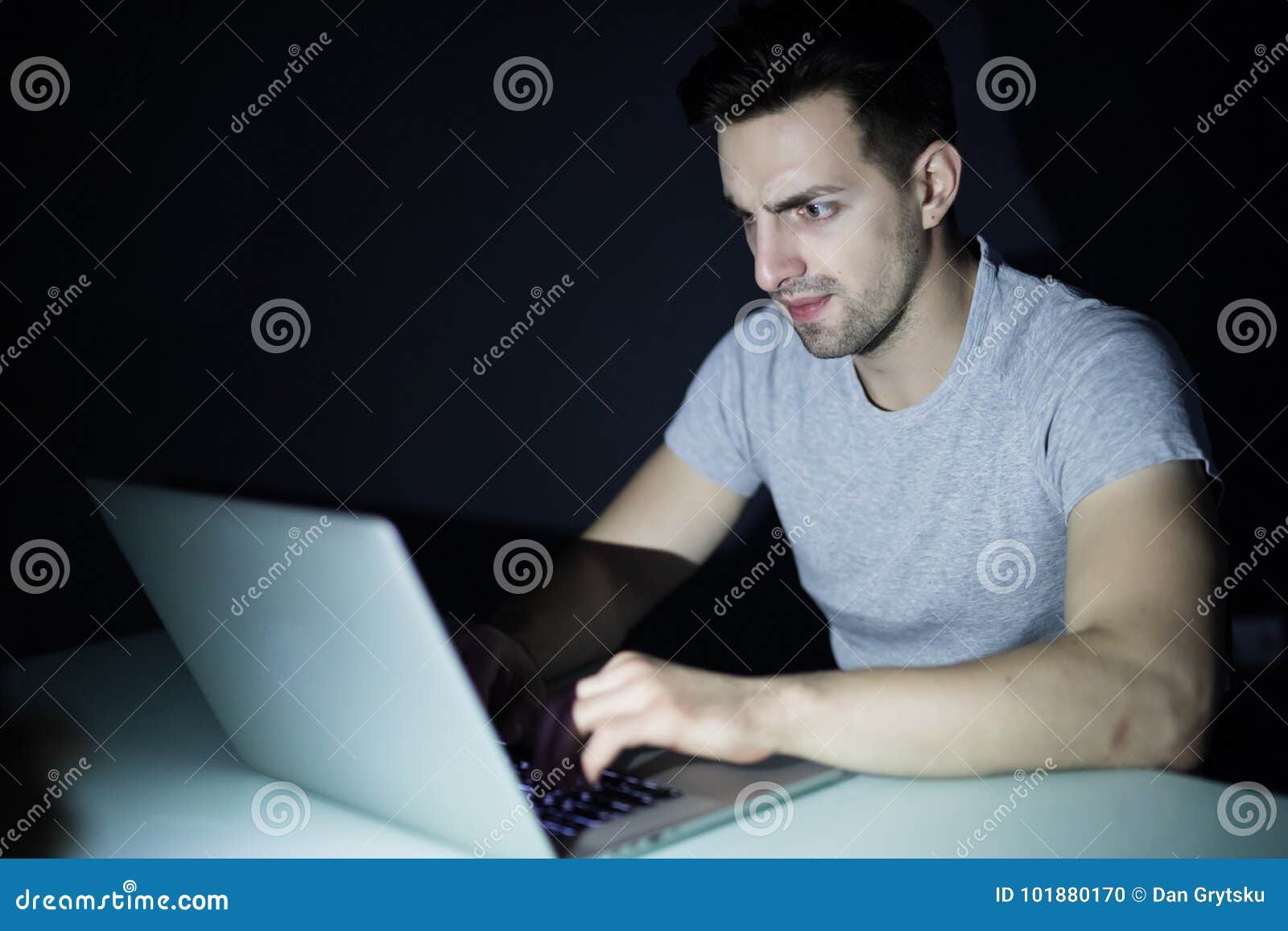 Late Night Internet Addiction or Working Late Man Using Laptop at a ...