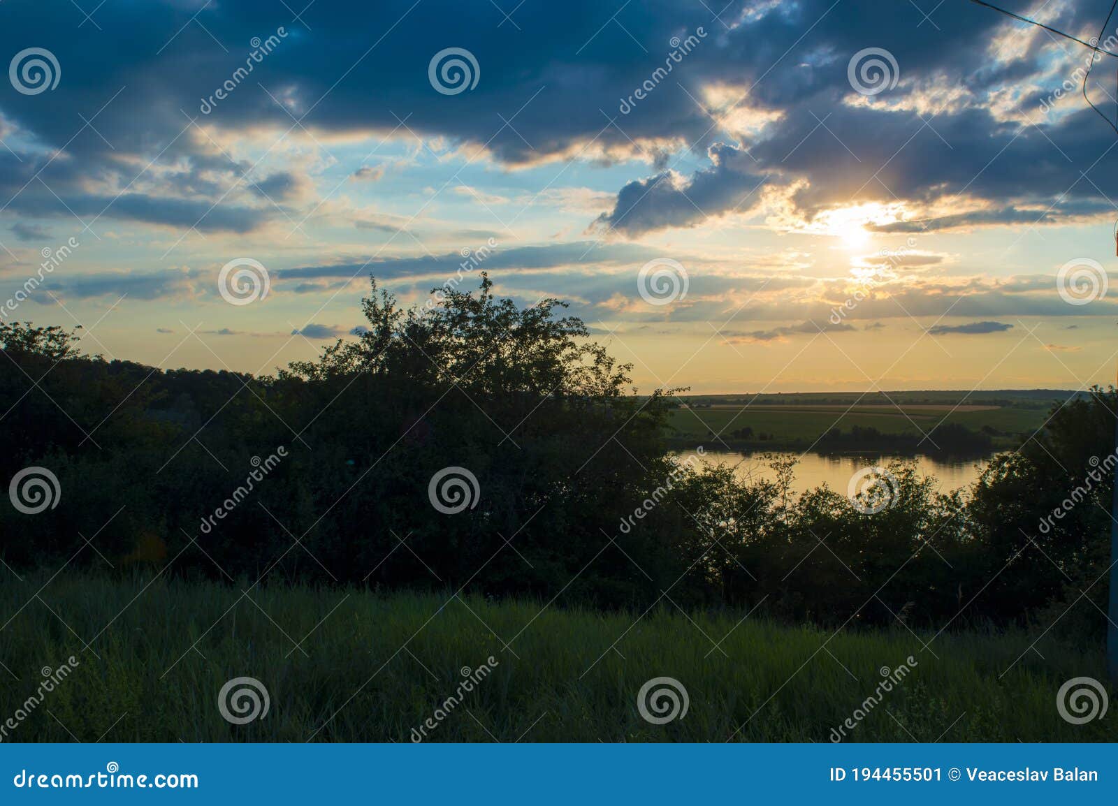 Late Sunset on the Lake Outside the City. Stock Image - Image of color ...