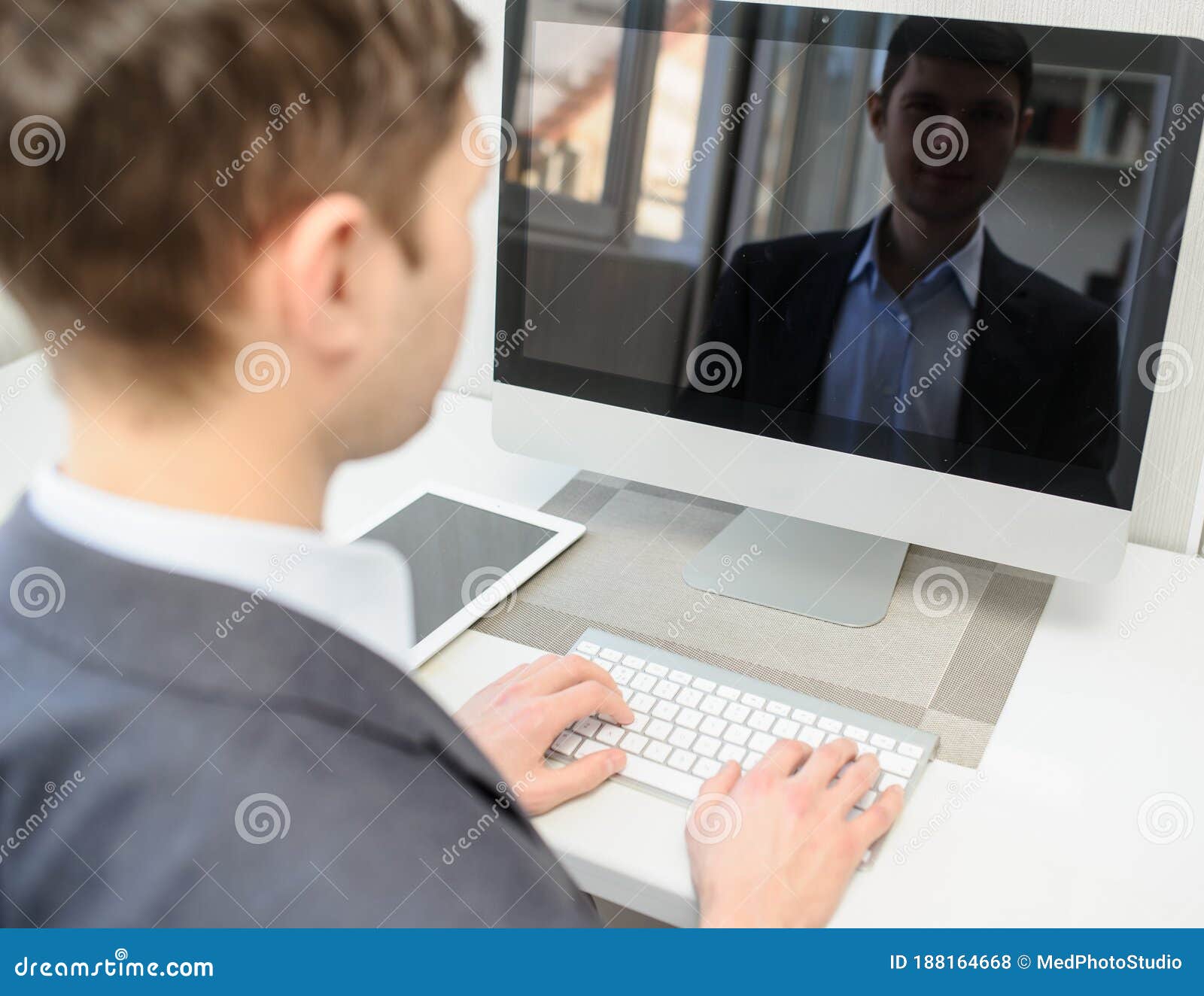 Lateral View of a Young Man Working on the Computer Stock Photo - Image ...
