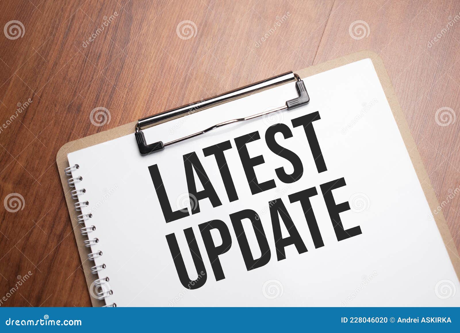 Latest Update Text on White Paper on the Wood Table Stock Photo - Image ...