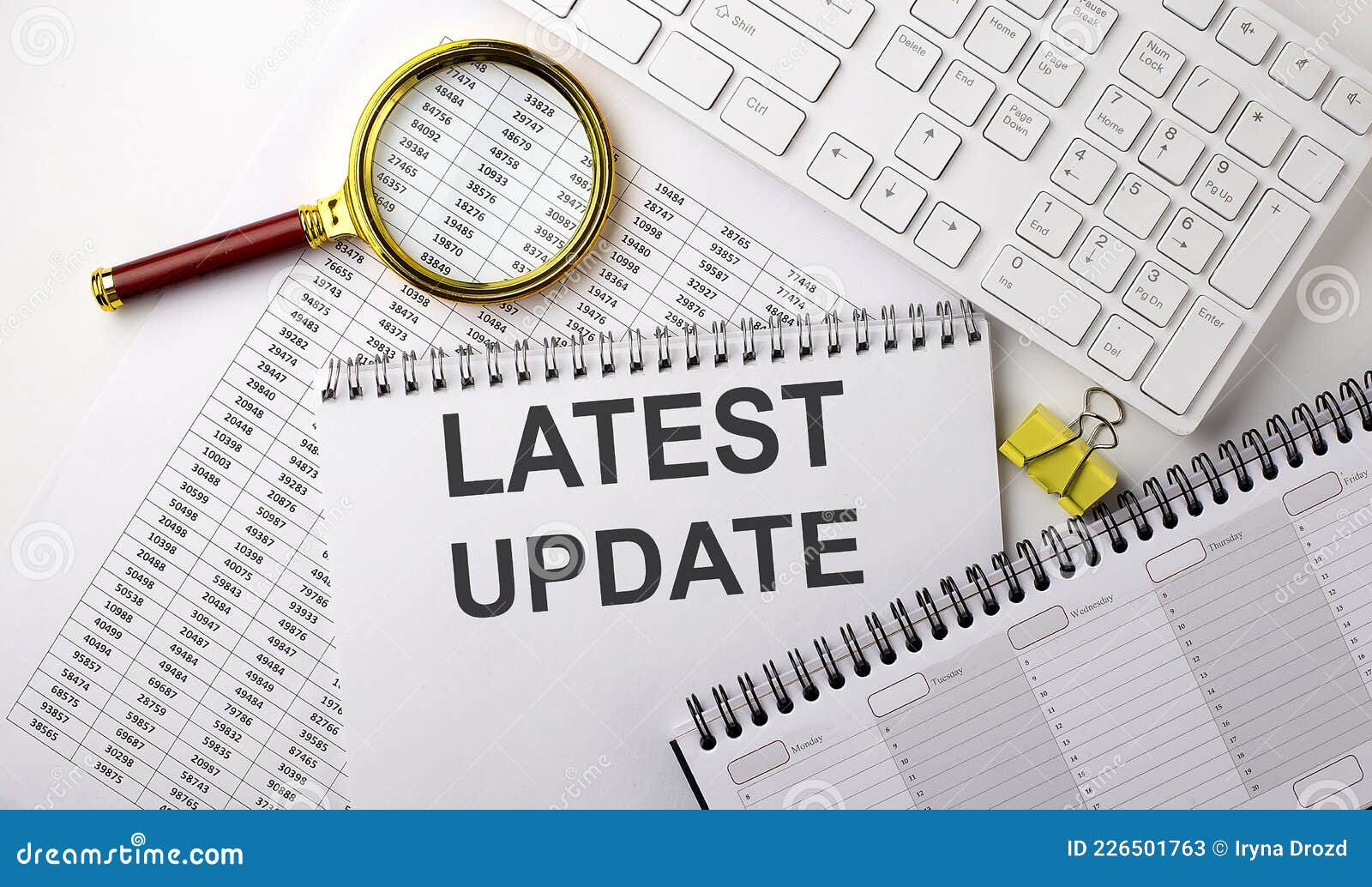 LATEST UPDATE Text Written on a Notebook on Chart with Keyboard and ...