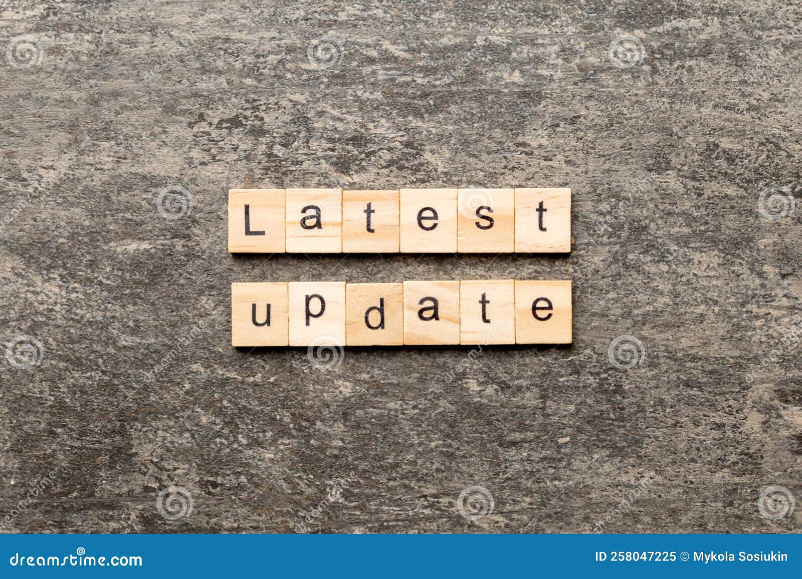 Latest Update Word Written on Wood Block. Latest Update Text on Table ...