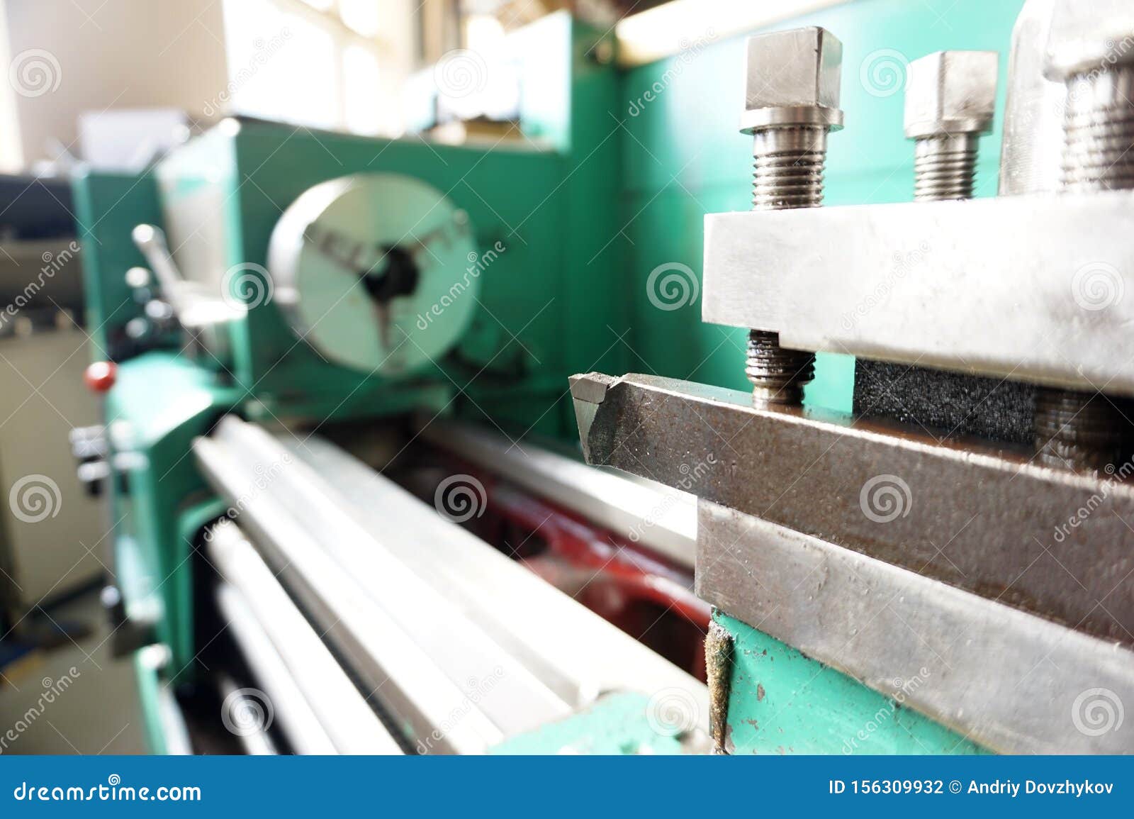 The Lathe is in Idle Mode, the Tool Holder Holds the Tool on the Guide ...