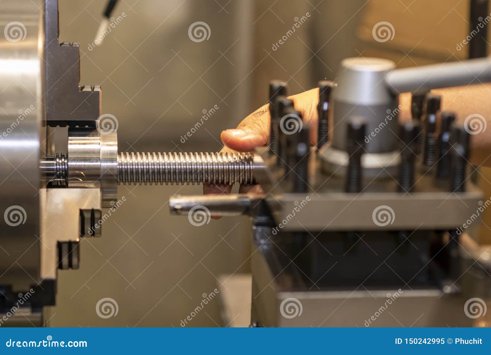 The Lathe Machine Cutting the Thread on the Steel Shaft. Stock Image ...