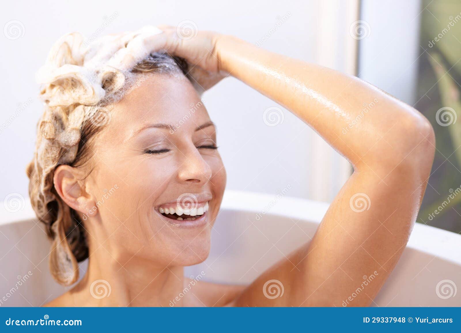 Lathering some soapy suds stock photo. Image of femininity - 29337948