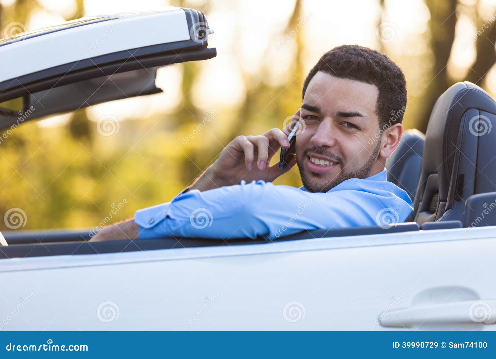 Latin American Driver Making a Phone Call while Driving Stock Image ...