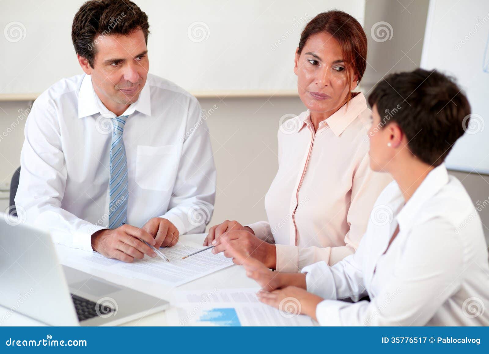 Latin Executive Team Working on Documents Stock Image - Image of male ...