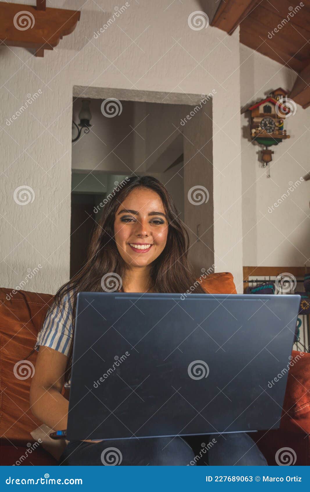 Latin Girl Working from Home, from Her Computer she Does Different ...