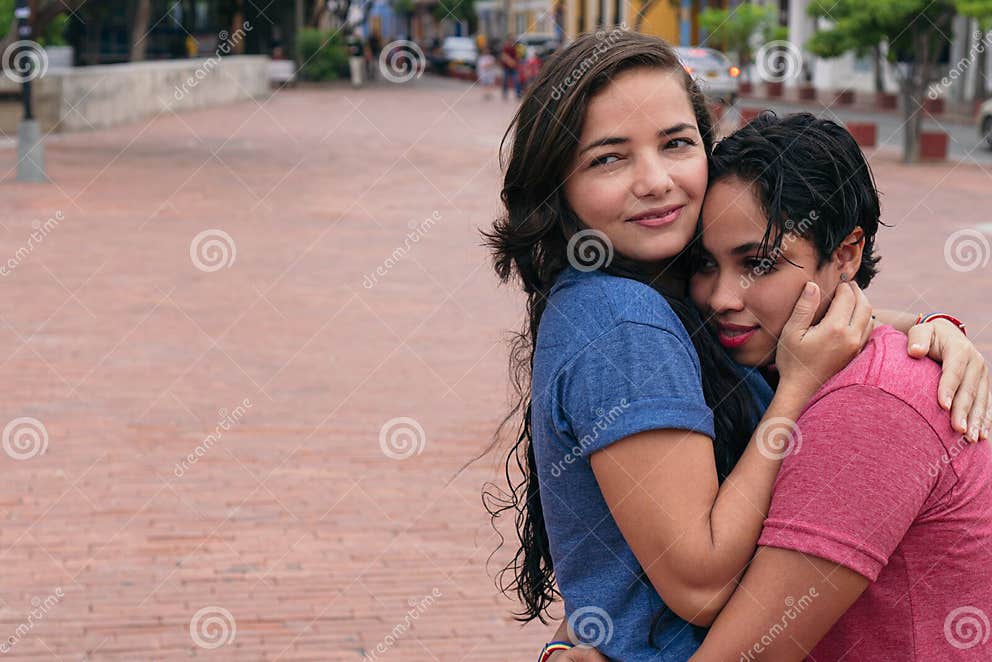 Latin Lesbian Couple Embracing In The City Stock Image Image Of Happiness Fashion 230114901