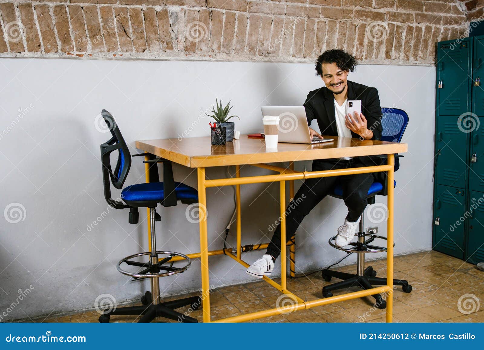 Latin Man Working with Computer at Office in Mexico City Stock Photo ...