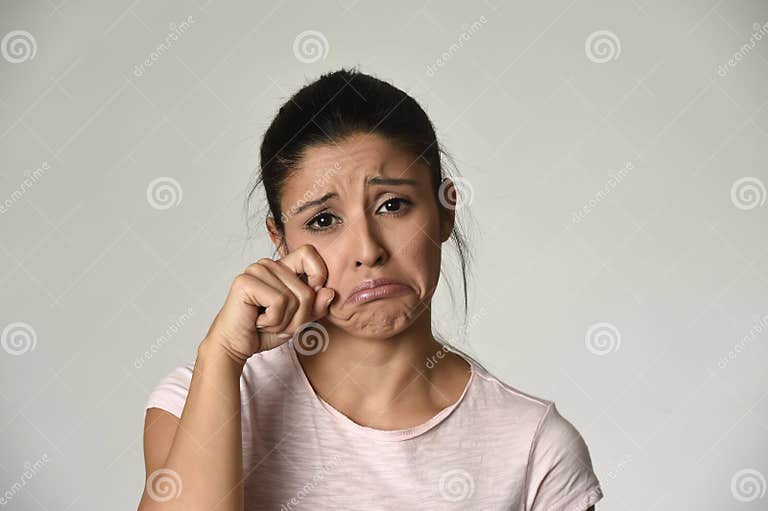 Latin Sad Woman Serious And Concerned Crying Desperate Overacting On