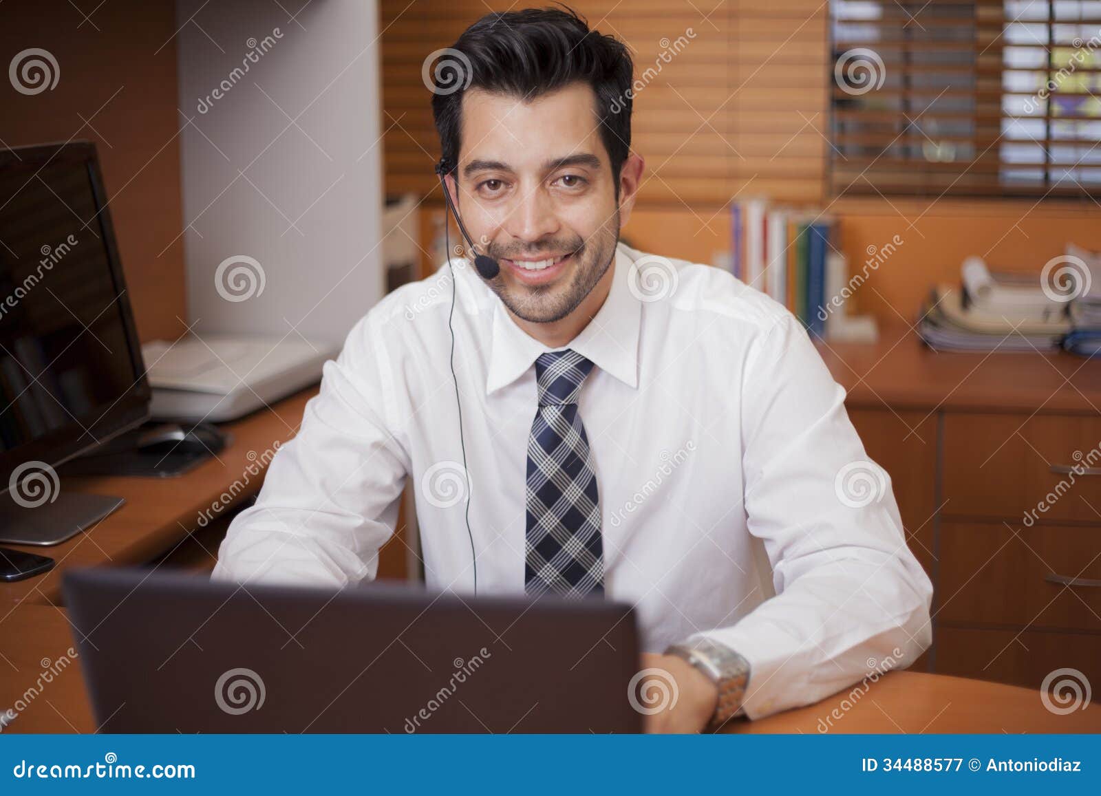 Latin Sales Rep Talking To a Client Stock Image - Image of happy, male ...