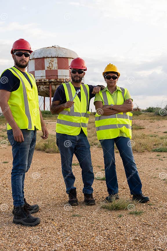 Latino Industrial Workers Standing in the Open Air Stock Photo - Image ...