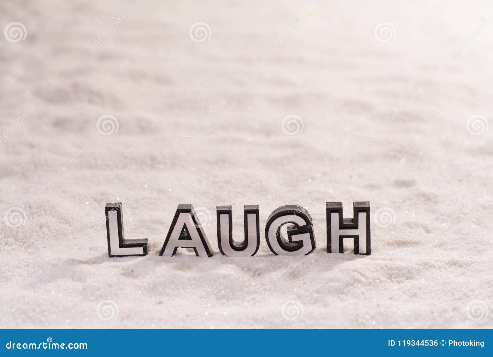 Laugh word on white sand stock photo. Image of laughing - 119344536