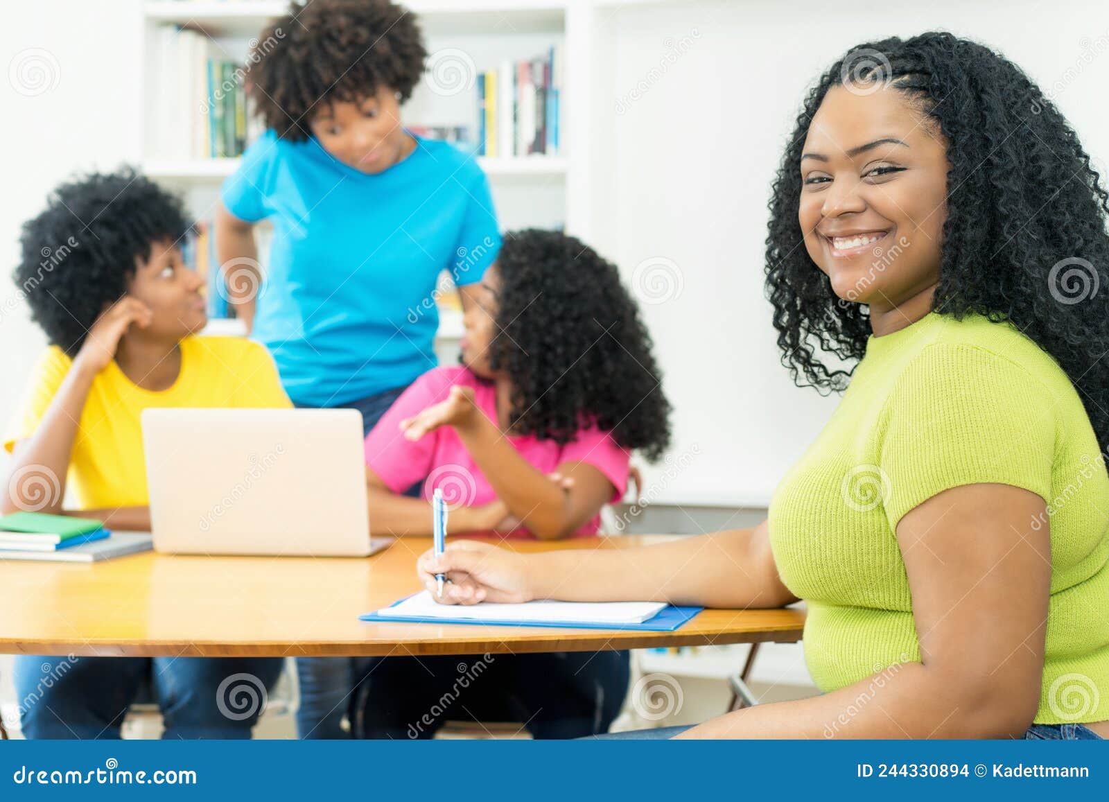 Laughing African American Computer Science Student with Group of Coding ...