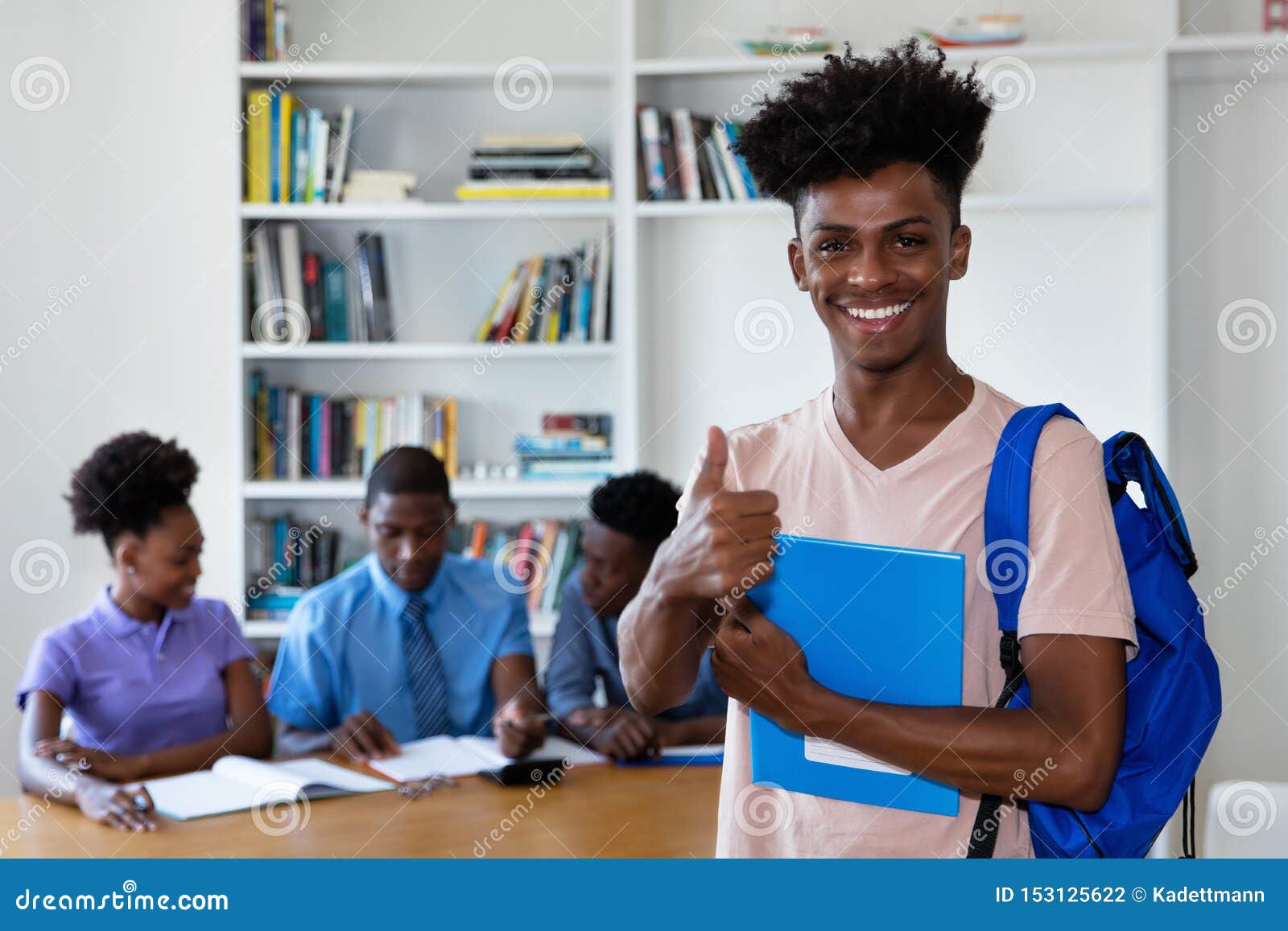 Laughing African Student at Classroom with Group of Young Adults Stock ...