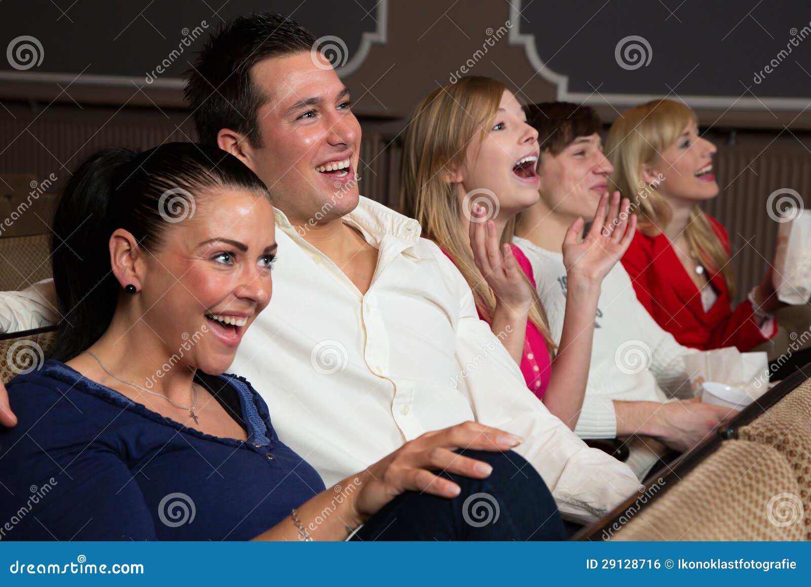 Laughing Audience at the Movies Stock Photo - Image of friendship ...