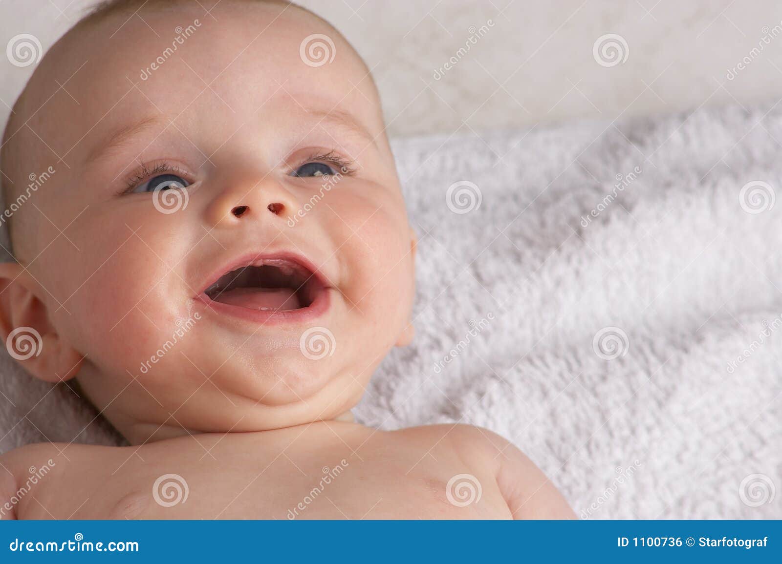 Laughing baby stock photo. Image of crawler, baby, innocence - 1100736