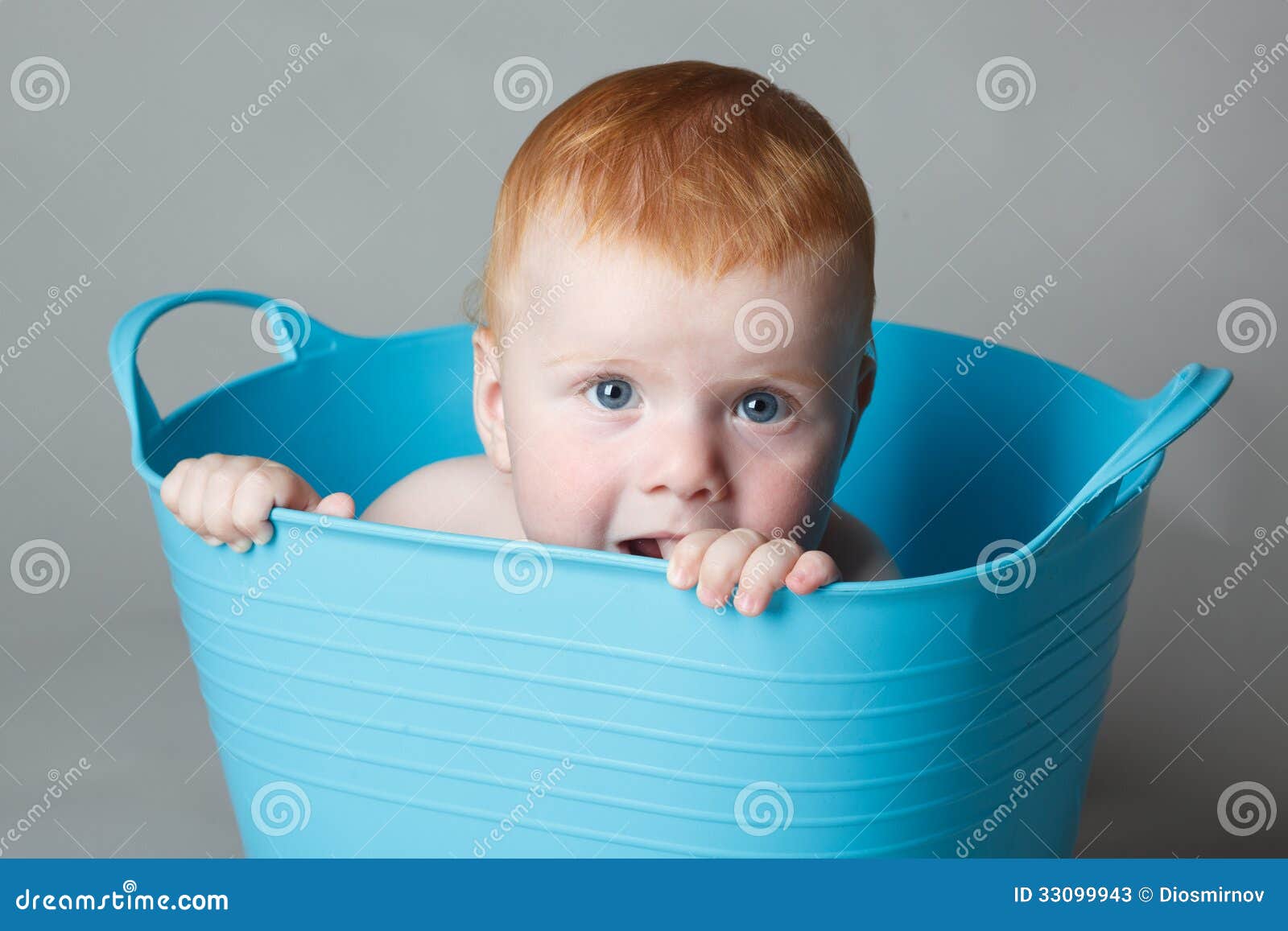 Laughing Baby in a Blue Bucket Stock Image - Image of person, looking ...