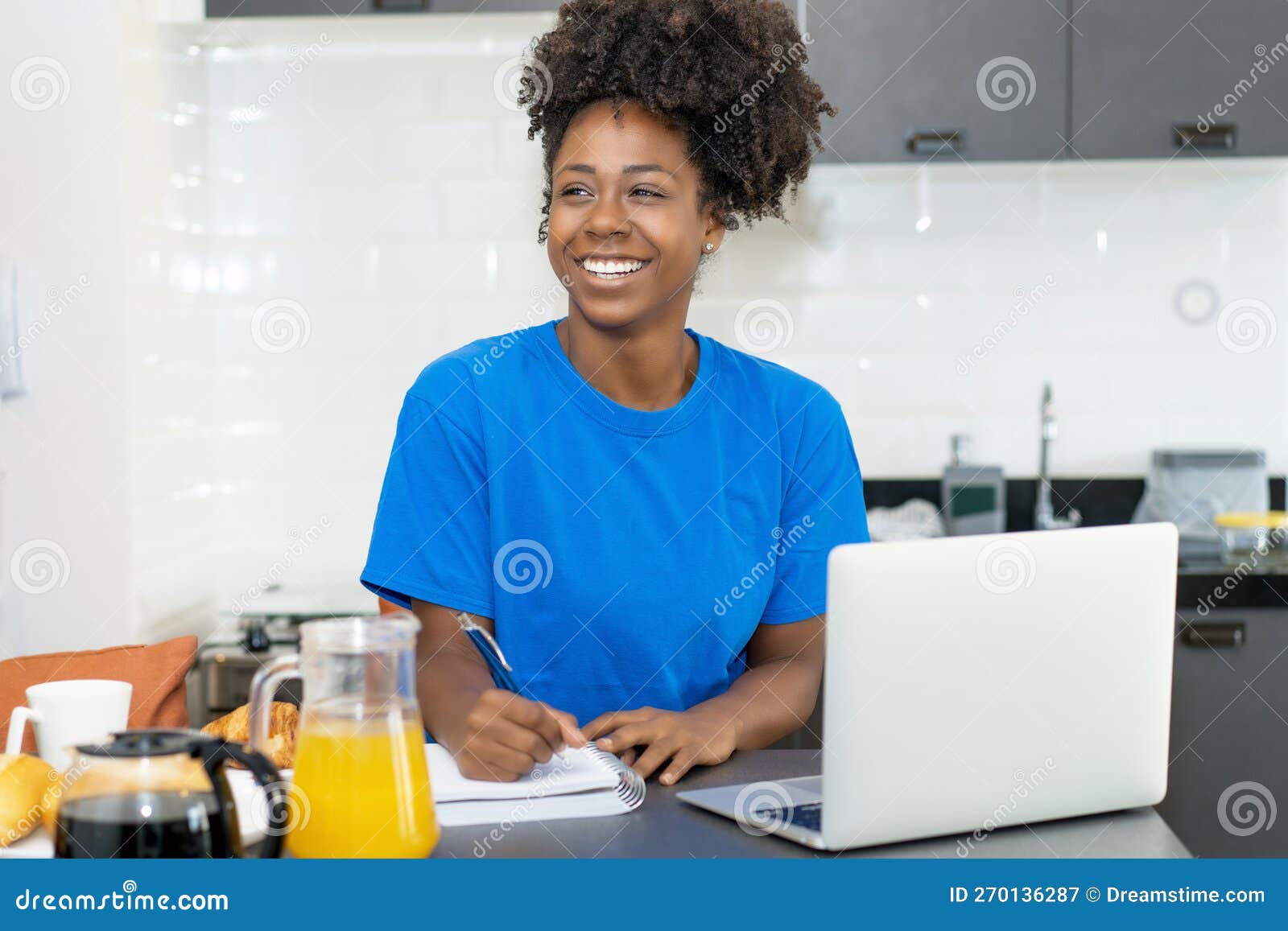 Laughing Black Woman with Computer Writing Notes Stock Image - Image of ...