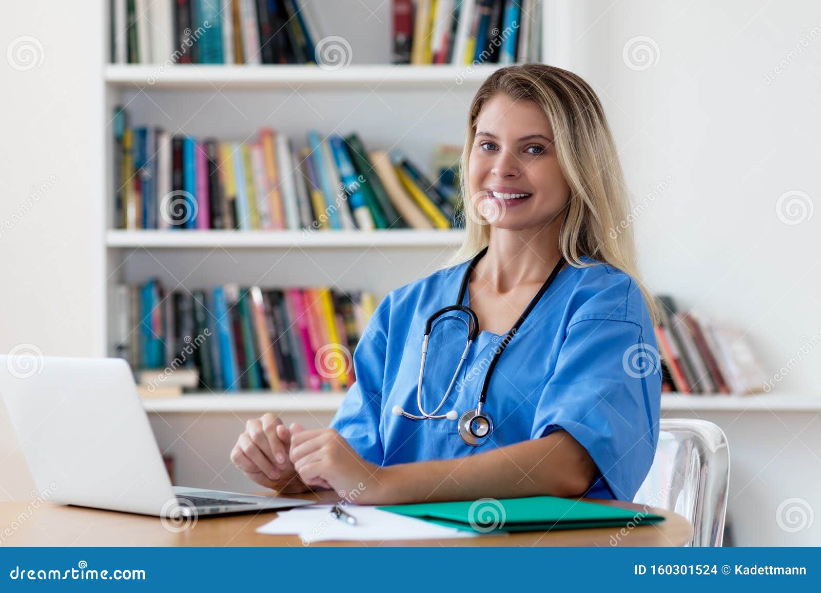 Laughing Blond Nurse Working at Computer Stock Photo - Image of ...