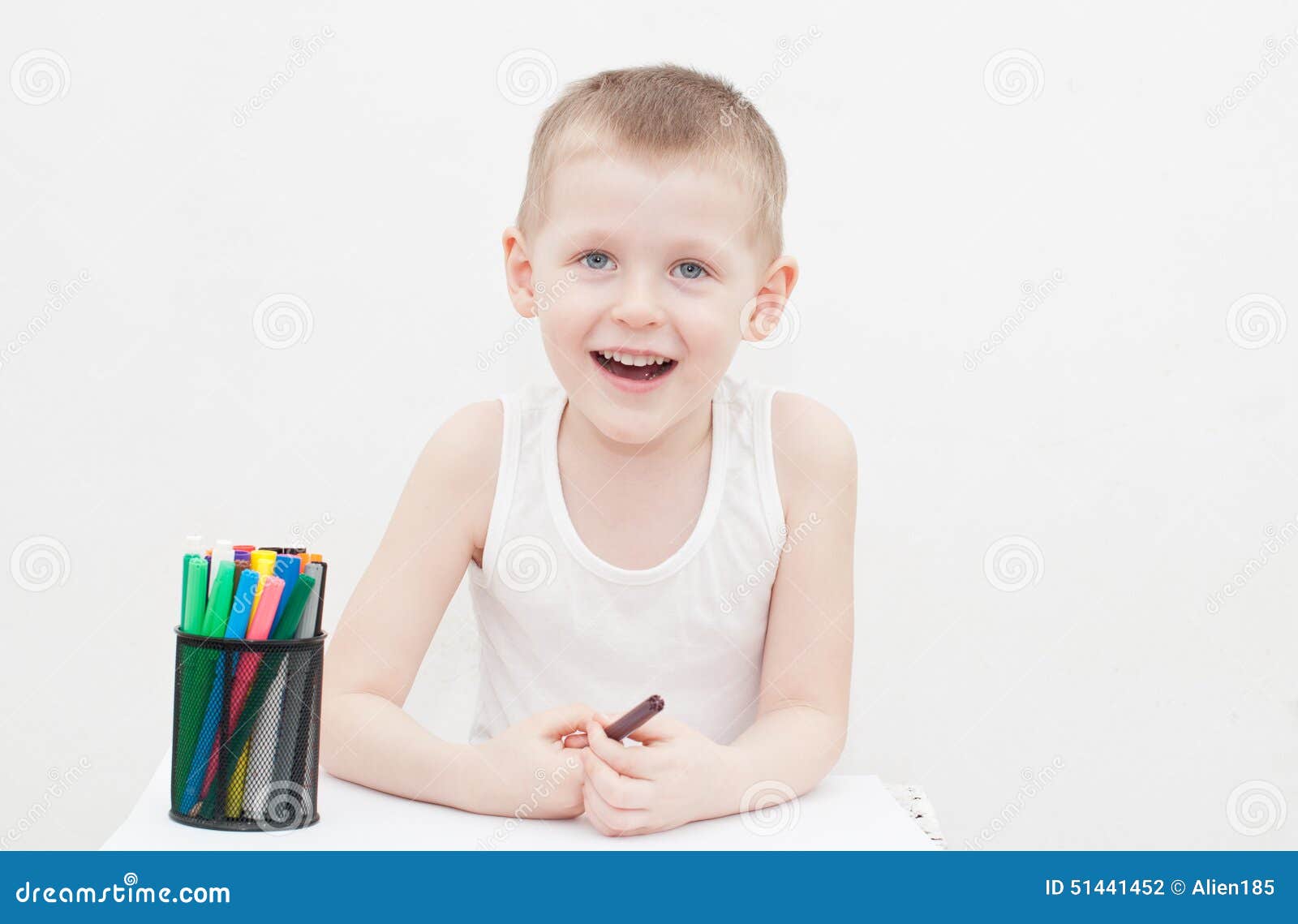Laughing boy is drawing stock photo. Image of cheerful - 51441452