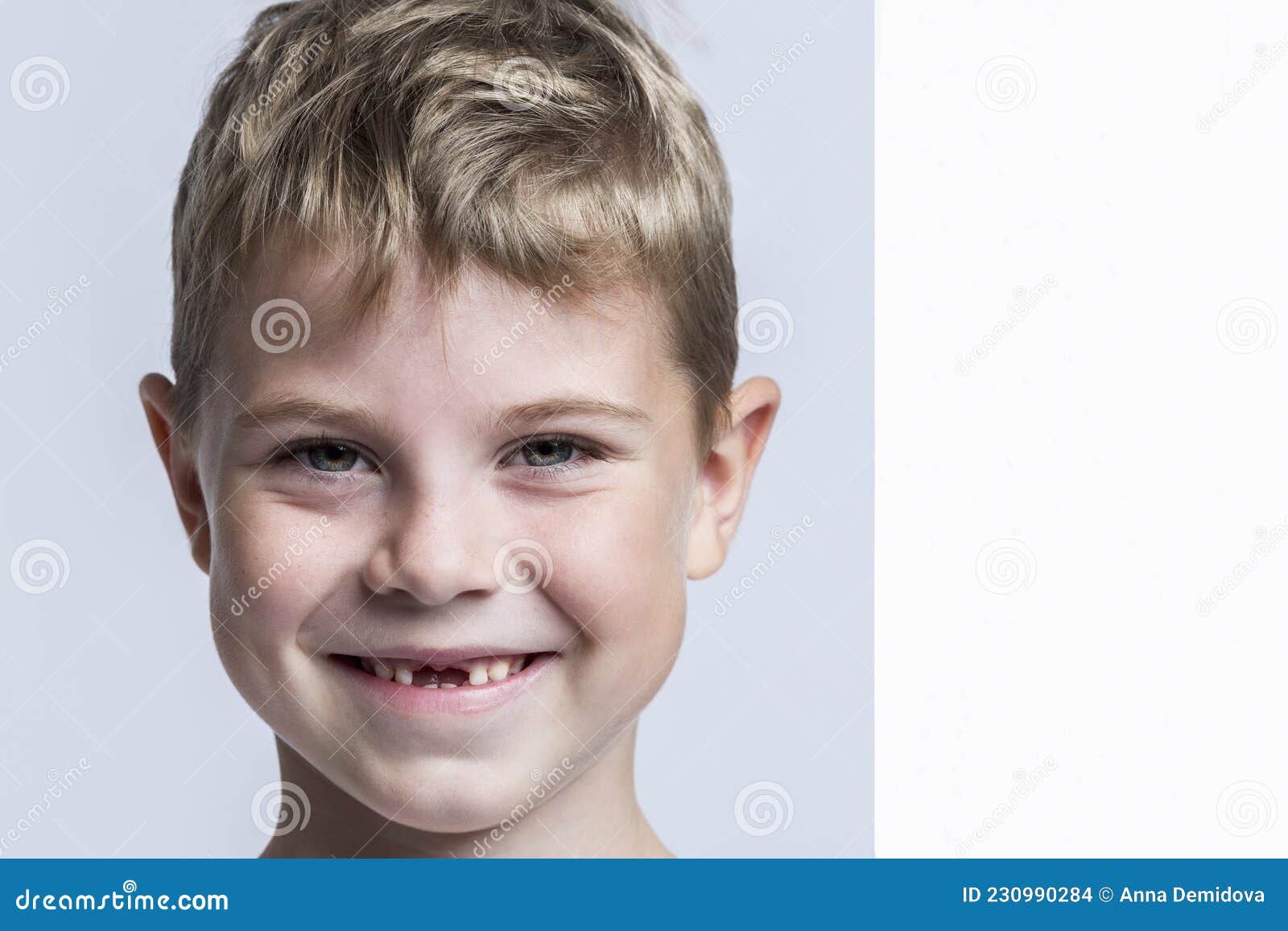Laughing Boy without Front Teeth. Gray Background Stock Photo - Image ...