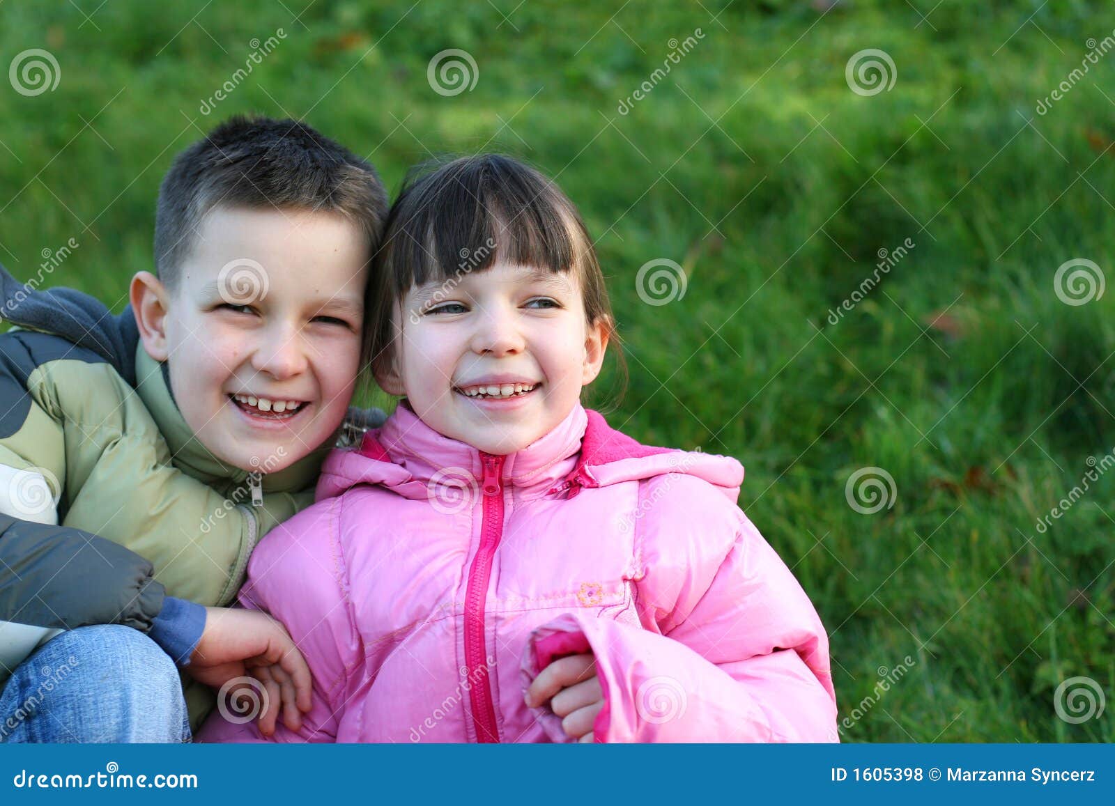 Laughing Brother and Sister in the Meadow Stock Photo - Image of child ...