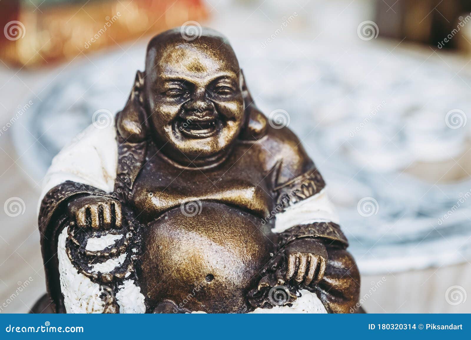 Laughing Buddha figurine stock photo. Image of laughing - 180320314