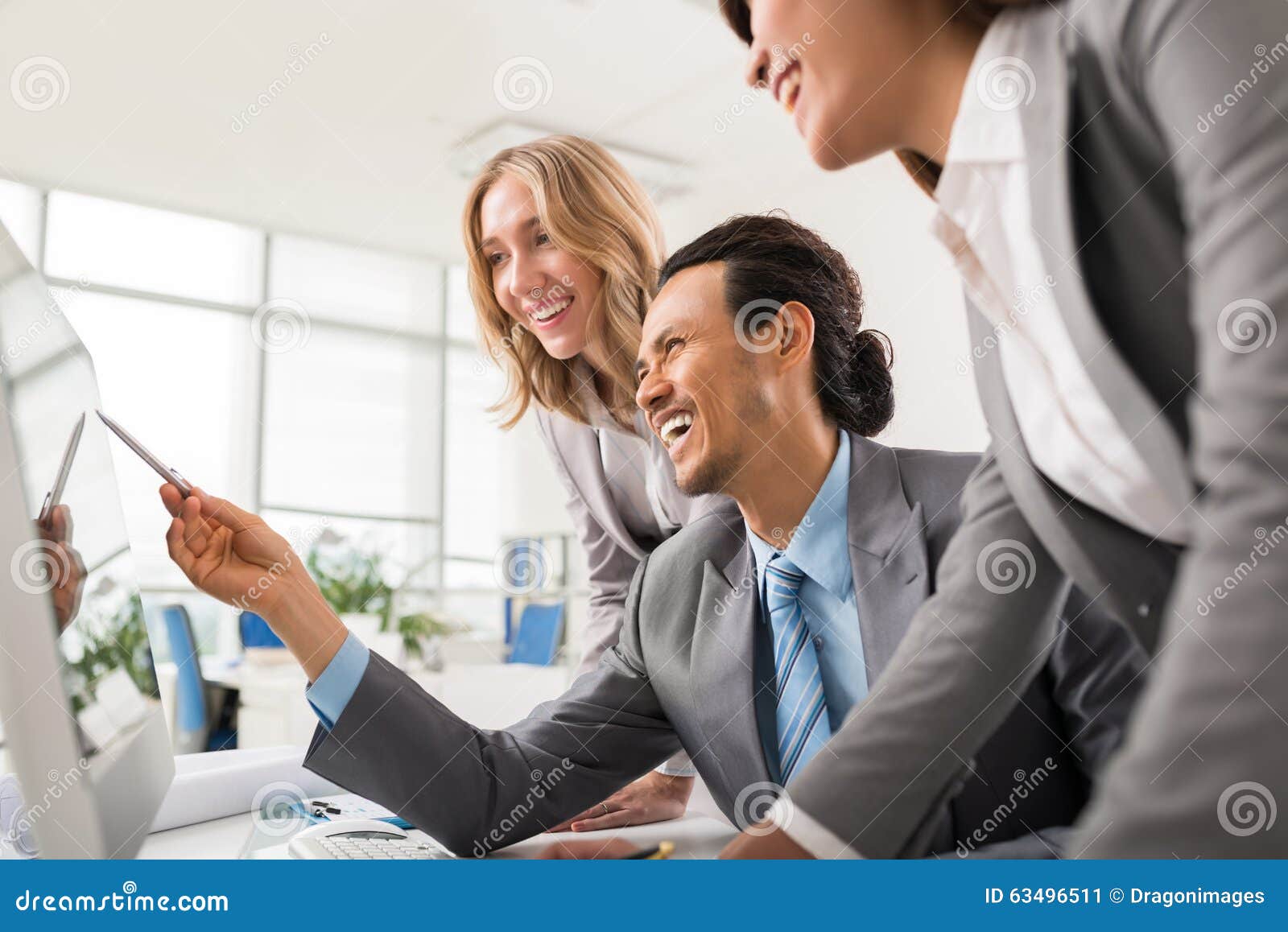 Laughing business people stock image. Image of computer - 63496511