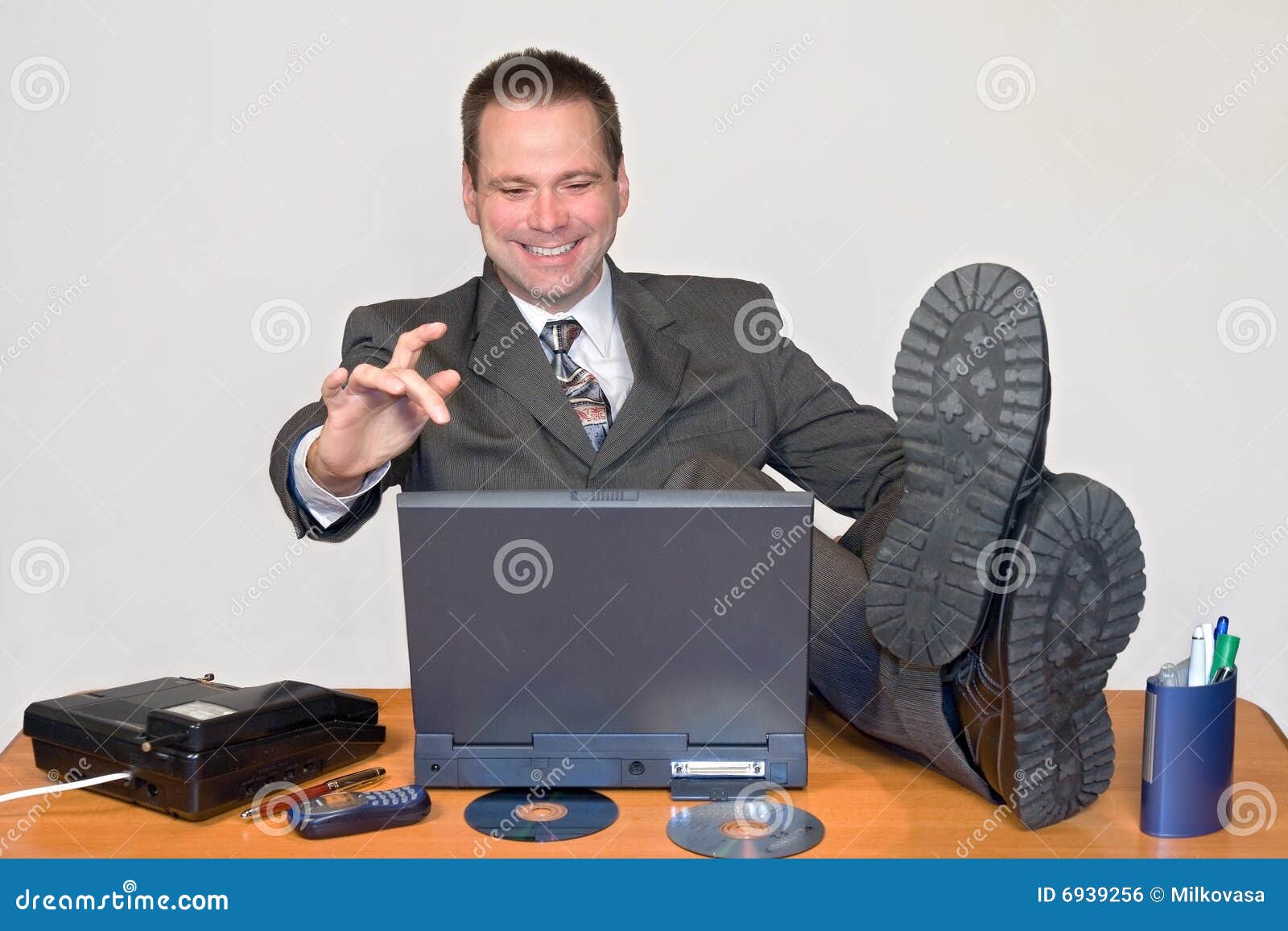 Laughing businessman stock photo. Image of businessman - 6939256