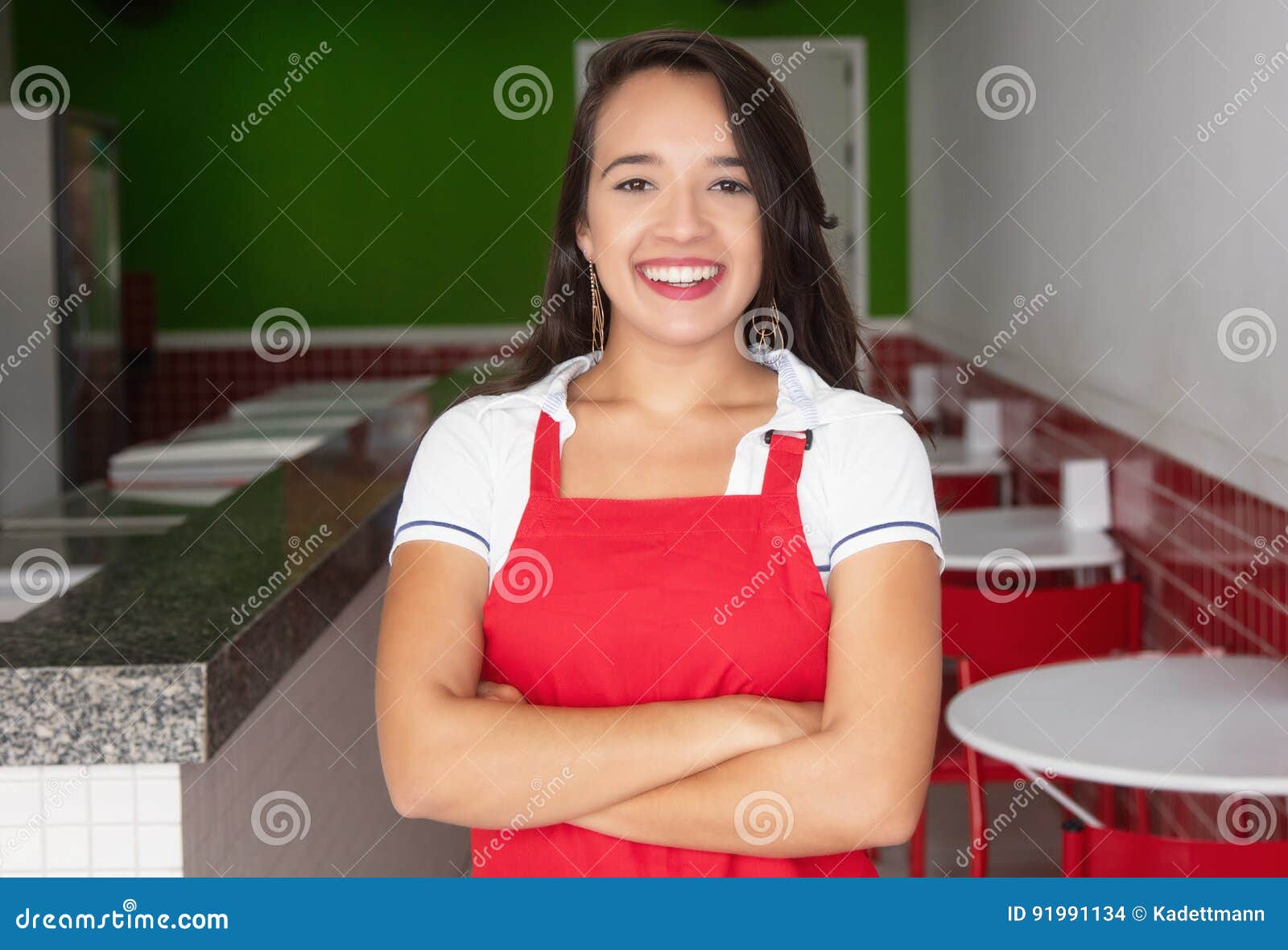 Laughing Caucasian Waitress in a Fast Food Restaurant Stock Photo ...