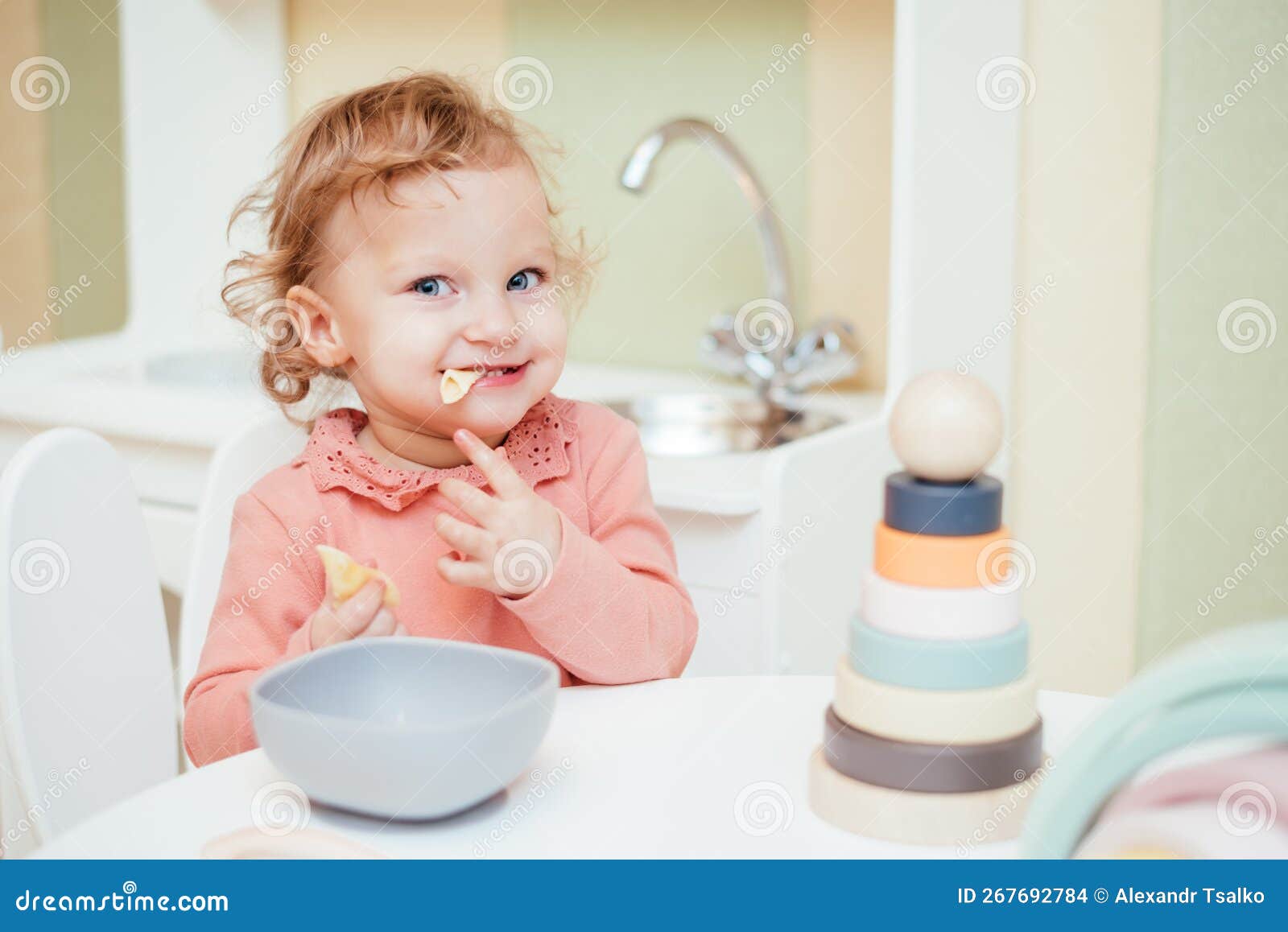 Laughing Child Eating Pasta in Kindergarten at the Table Stock Photo ...