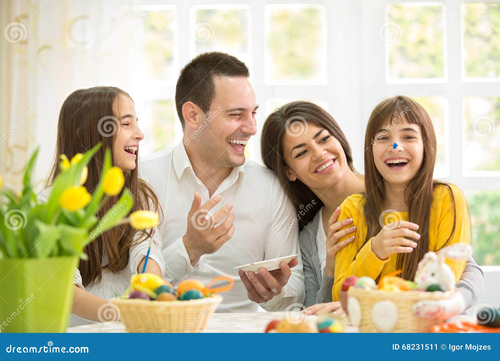 Laughing family on Easter stock image. Image of brush - 68231511