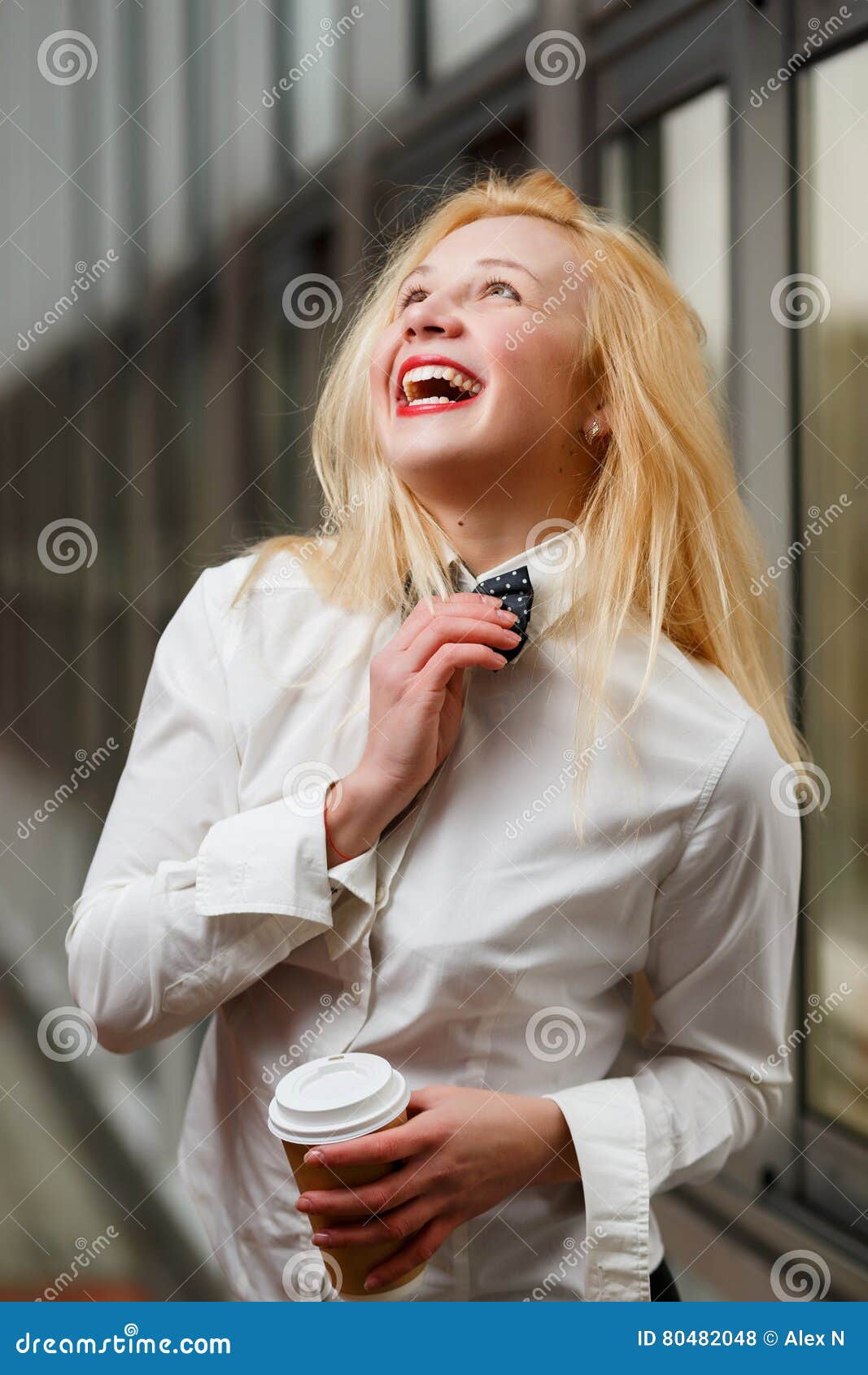 Laughing Ginger in White Shirt Standing in Building Stock Photo - Image ...