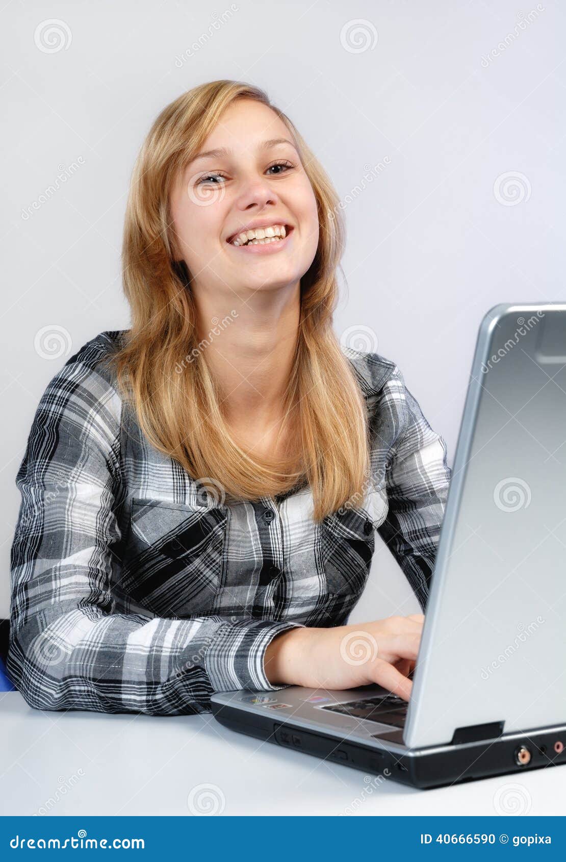 Laughing girl with laptop stock photo. Image of radiation - 40666590