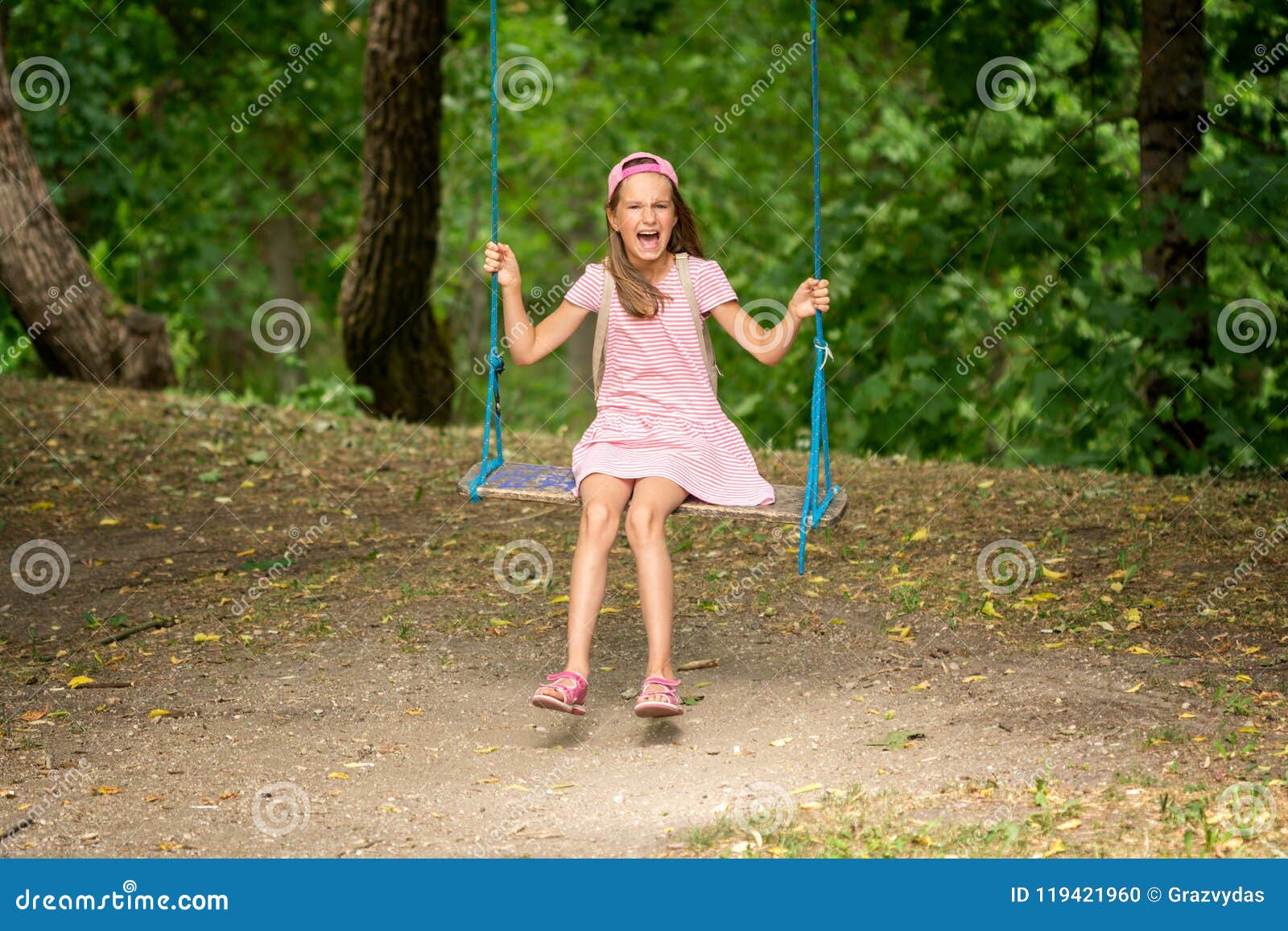 Laughing Girl on a Tree Swings Stock Photo - Image of lifestyles ...