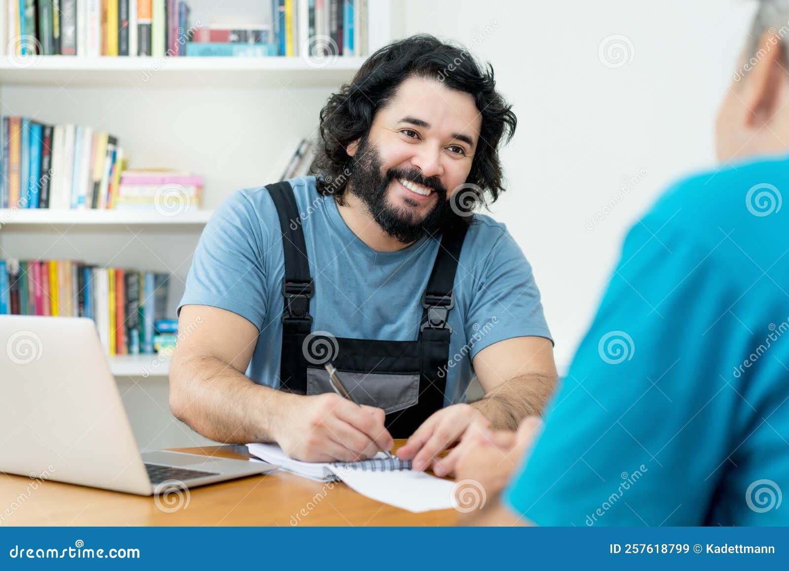 Laughing Handyman Talking about Contract and Order with Customer Stock ...