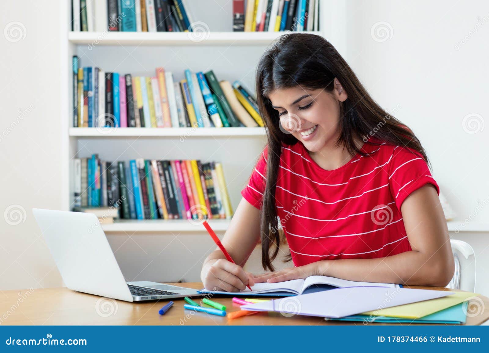 Laughing Hispanic Female Student Learning Language Online Using ...