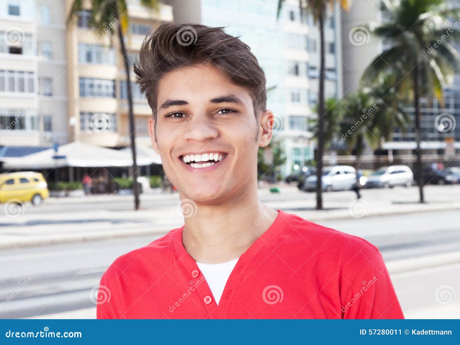 Laughing Hispanic Guy in the City Looking at Camera Stock Image - Image ...