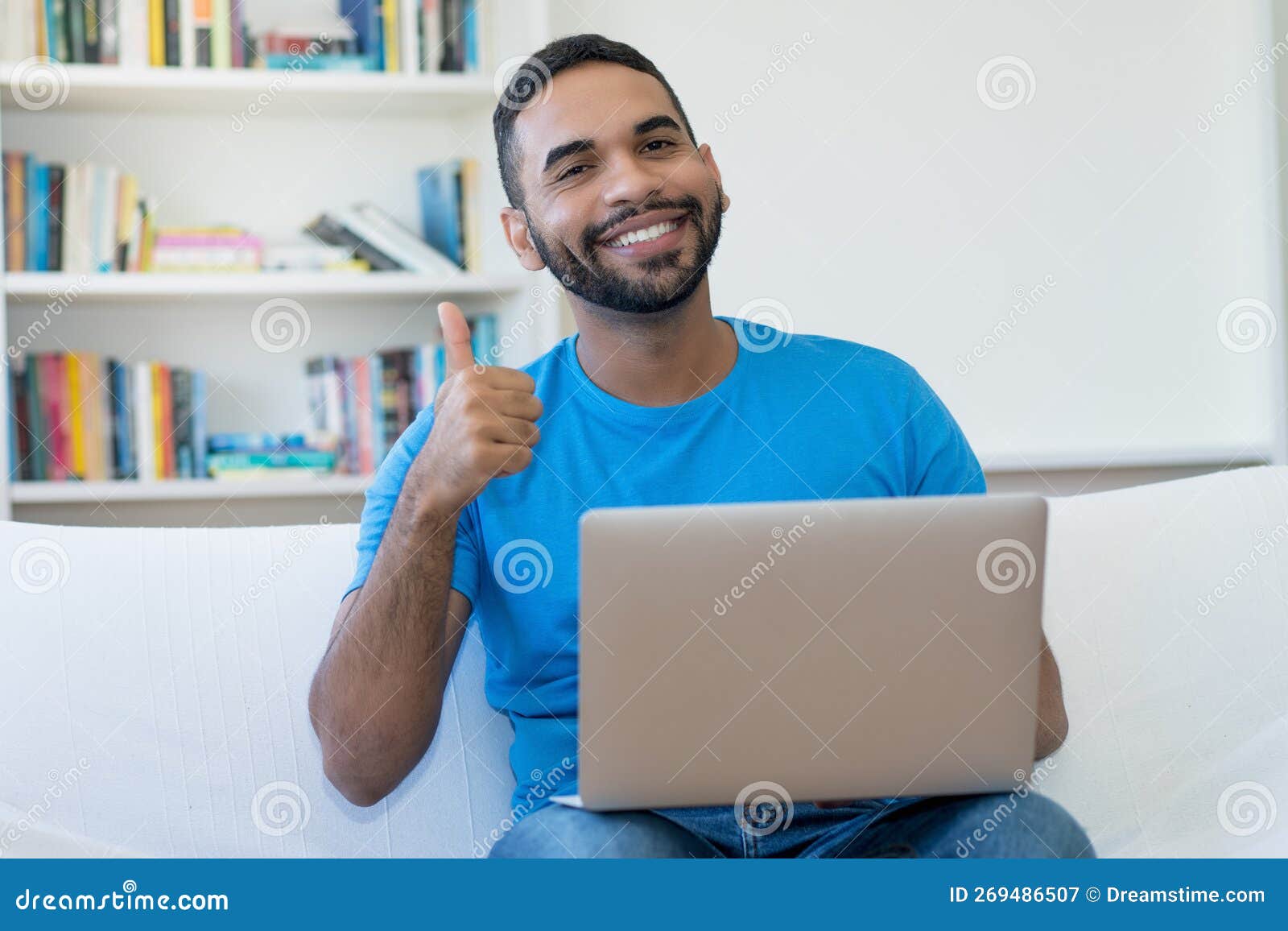 Laughing Latin American Male Programmer at Work at Computer Stock Image ...
