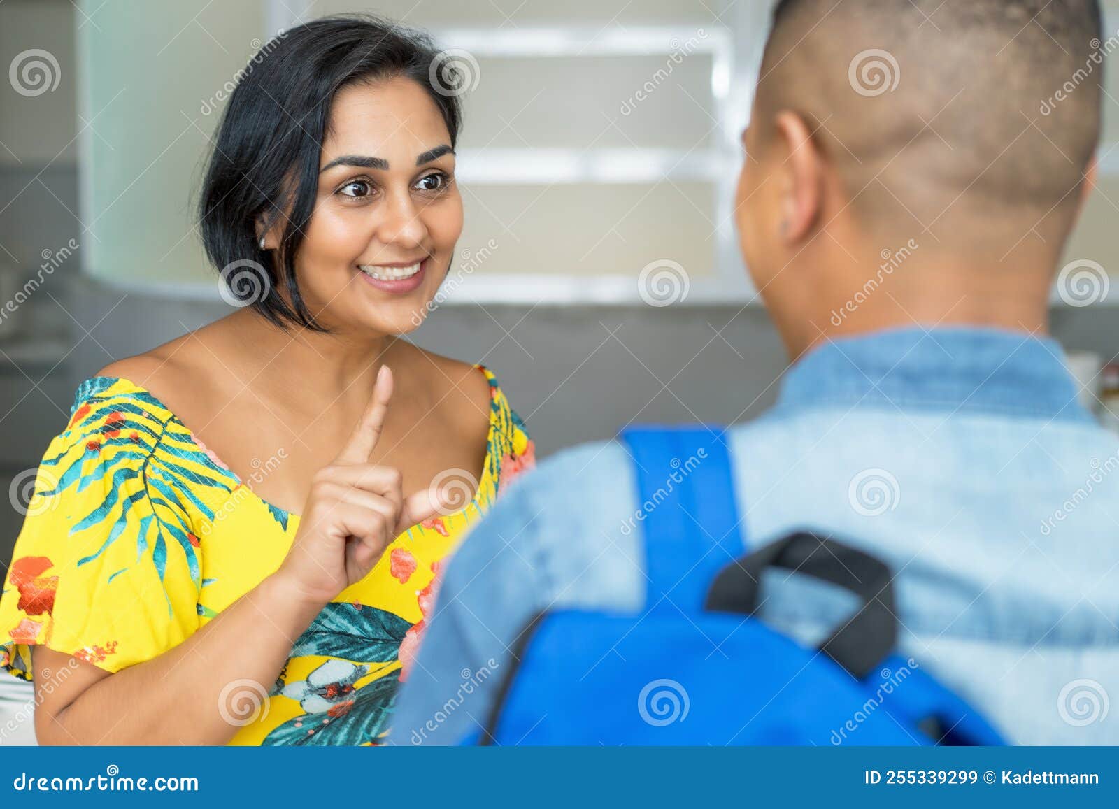 Laughing Latin American Teacher Talking with Student Stock Image ...