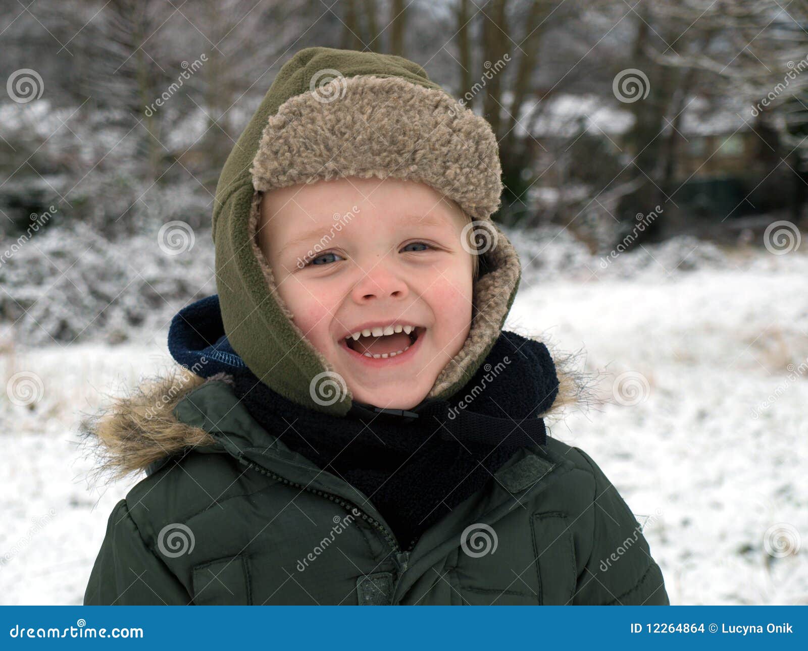 Laughing little boy stock photo. Image of nature, snow - 12264864