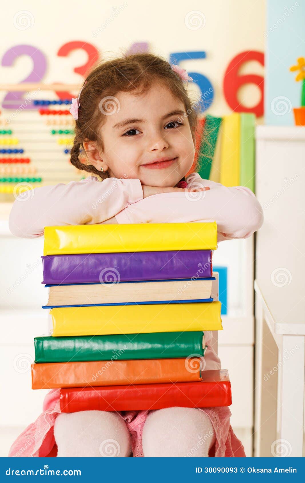 Little girl with books stock image. Image of colored - 30090093