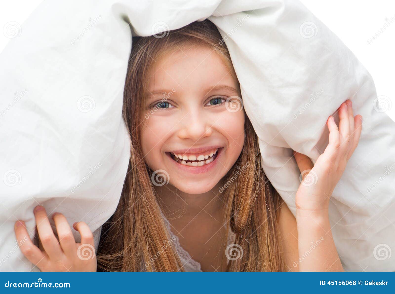 Laughing Little Girl Under a Blanket Stock Photo - Image of smiling ...