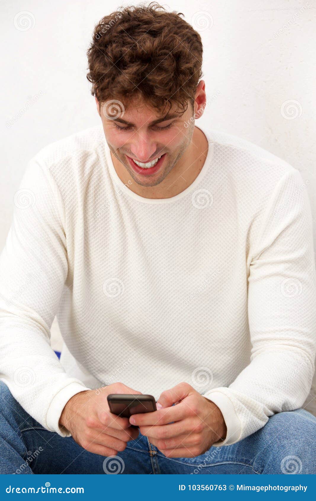Laughing Man Sitting with Mobile Phone Isolated on White Stock Image ...