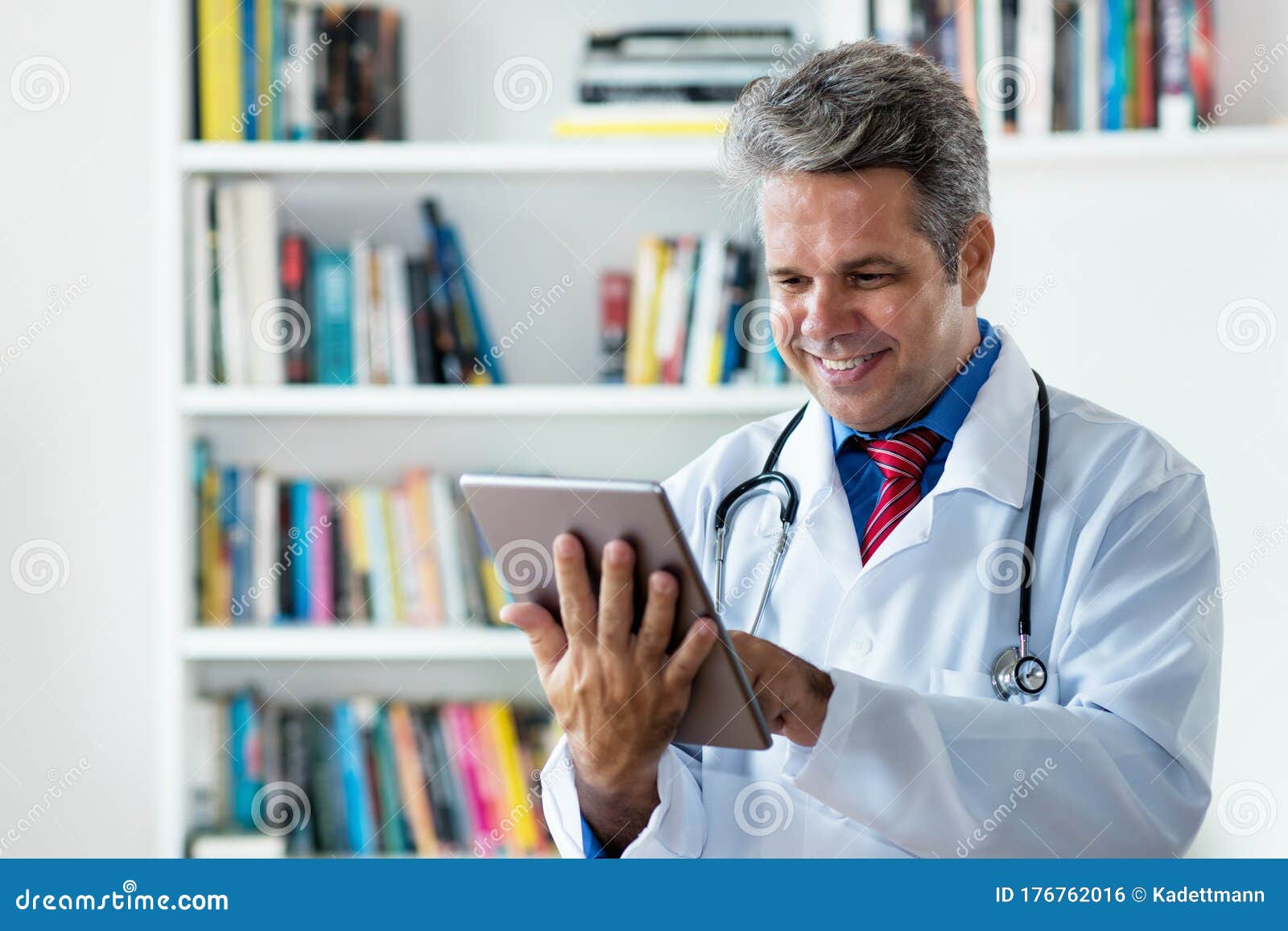 Laughing Mature Doctor with Tablet Computer Stock Photo - Image of ...