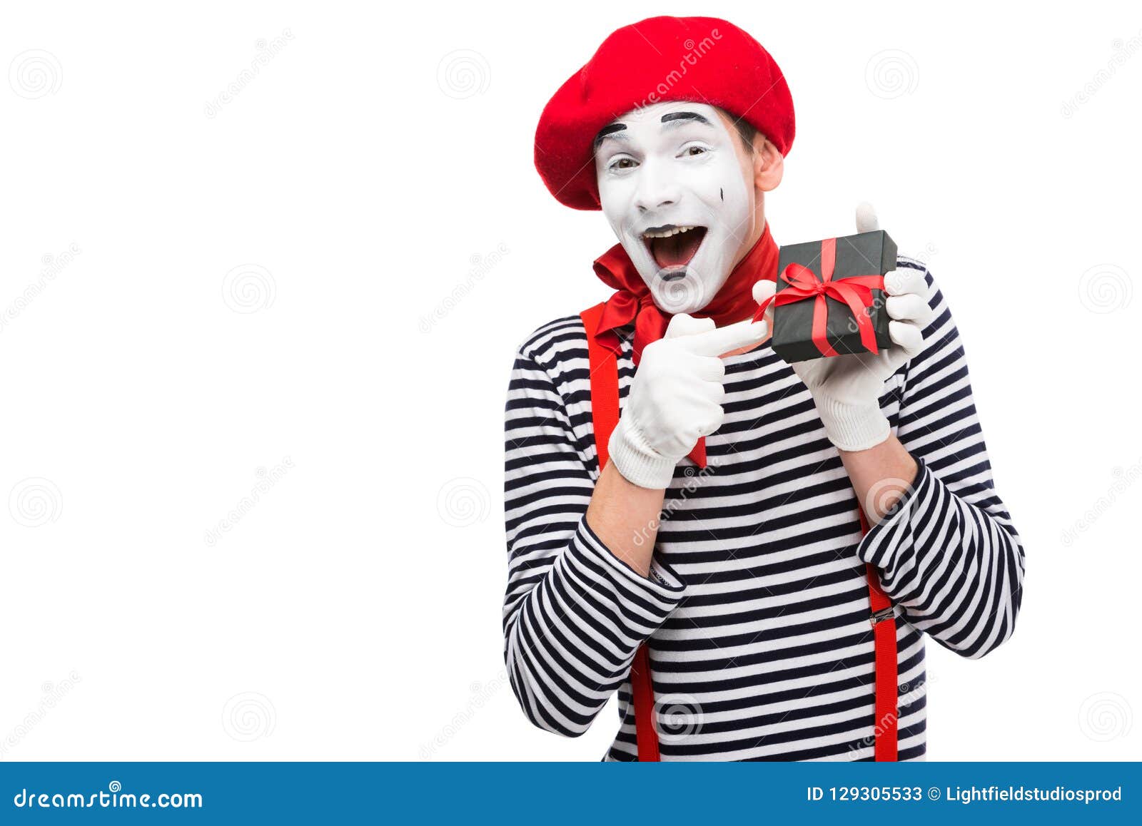 Laughing Mime Pointing on Present Box Stock Image - Image of alone ...