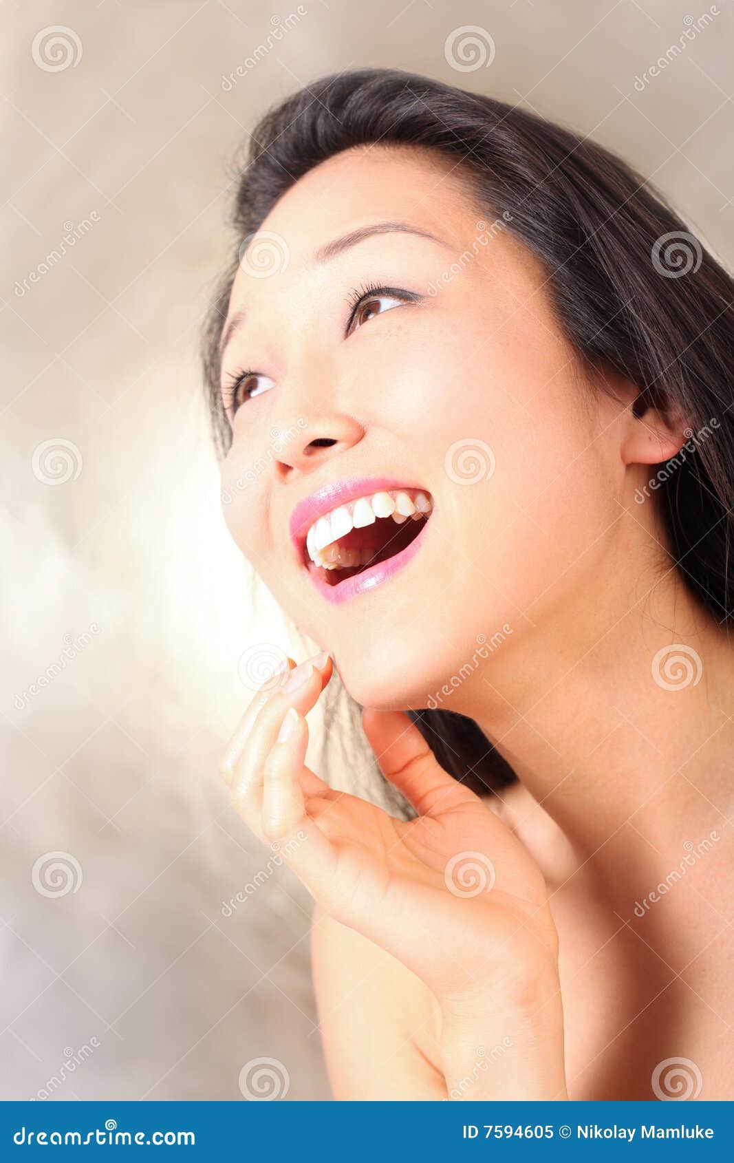 Laughing Model On Golden Background Royalty-Free Stock Photo ...