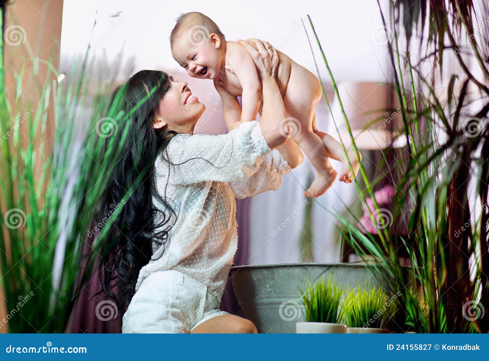 Laughing mum and baby stock image. Image of childhood - 24155827